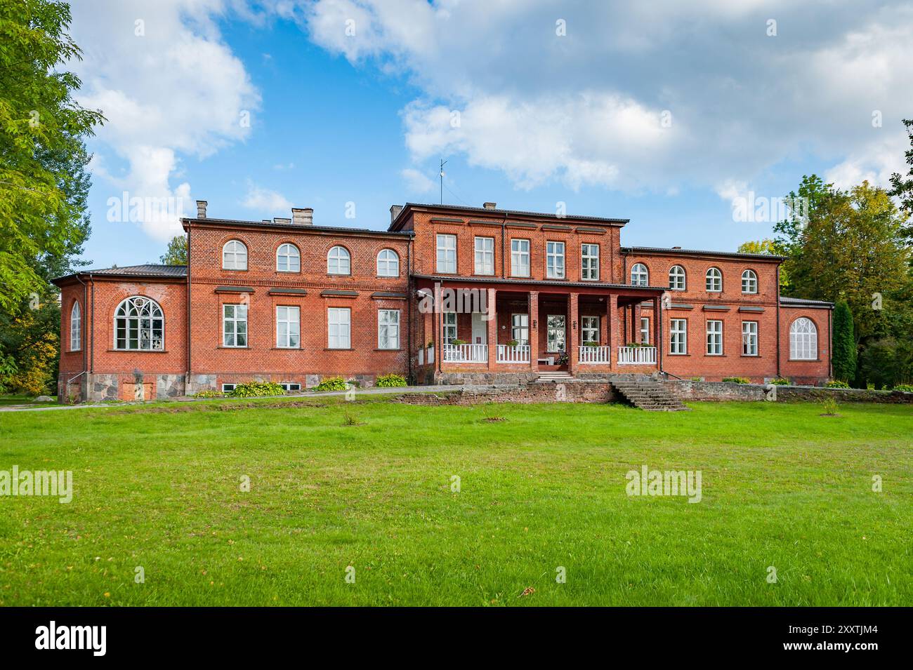 Red brick manor in Allikukivi, Estonia. Allikukivi manor with its ...