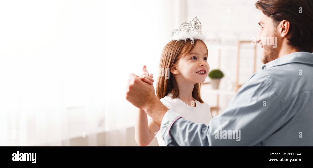 Little princes dancing with her father at home Stock Photo - Alamy