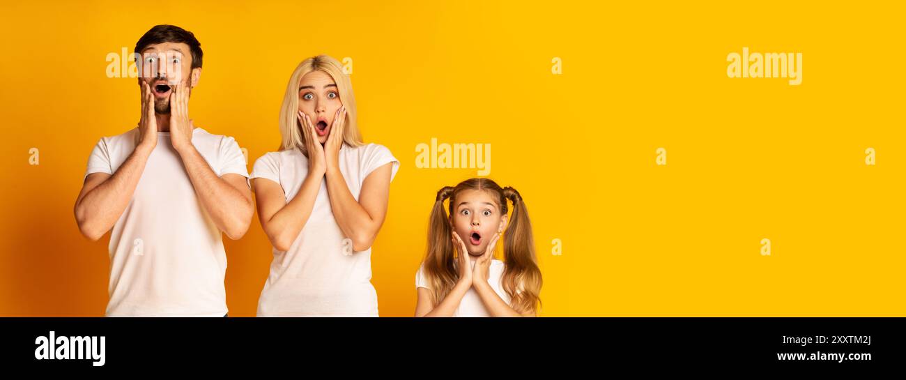 Family of Three Expressing Surprise on Bright Yellow Background Stock ...