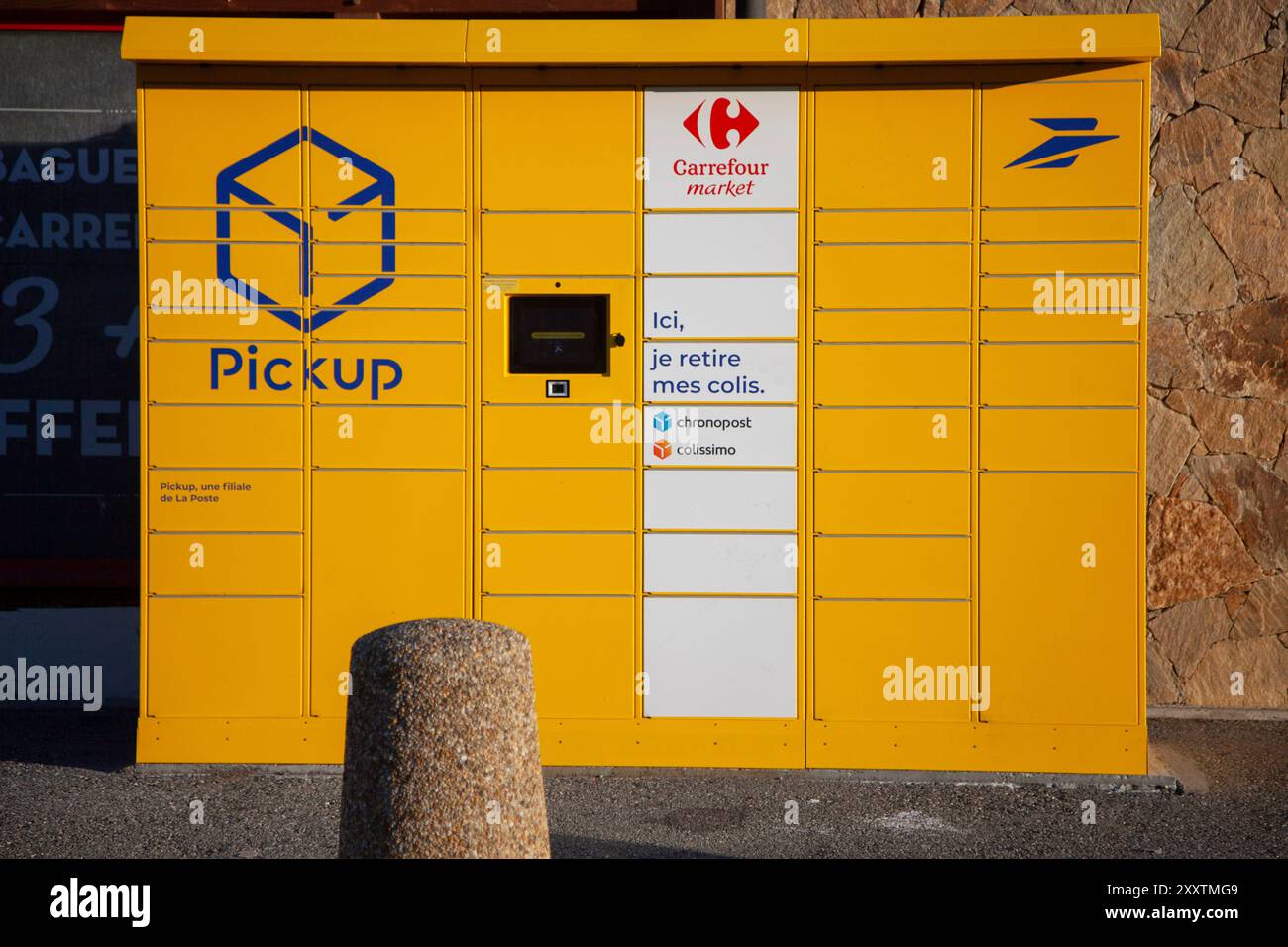 Carrefour Market in Briancon (south-eastern France):La Poste parcel ...