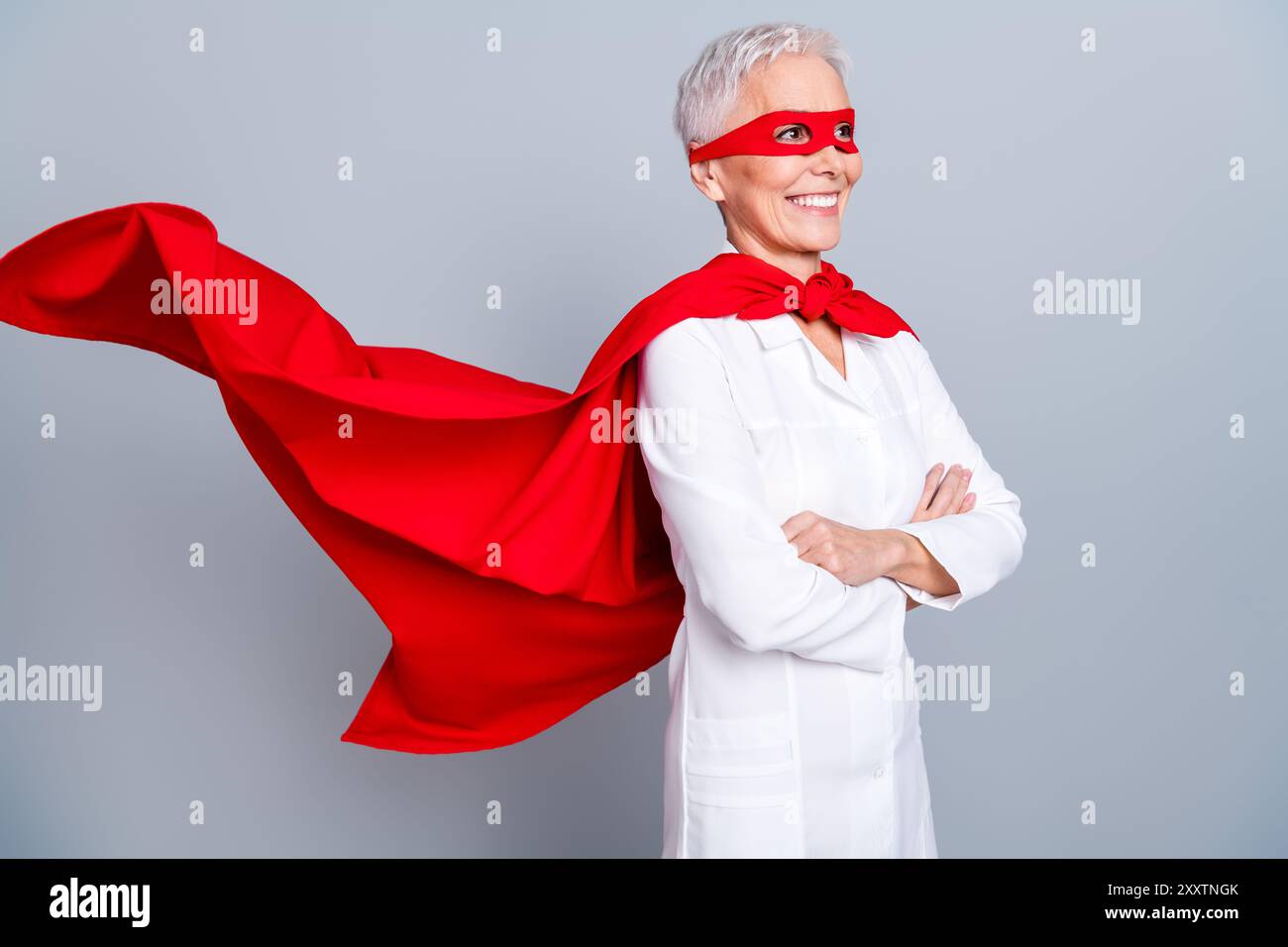 Photo of strong old lady scientist in super hero cloak crossing arms ...