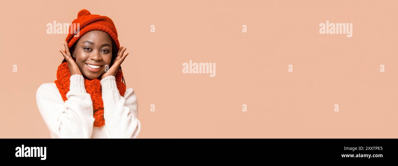 Portrait of joyful black woman touching her cheeks with hands Stock ...