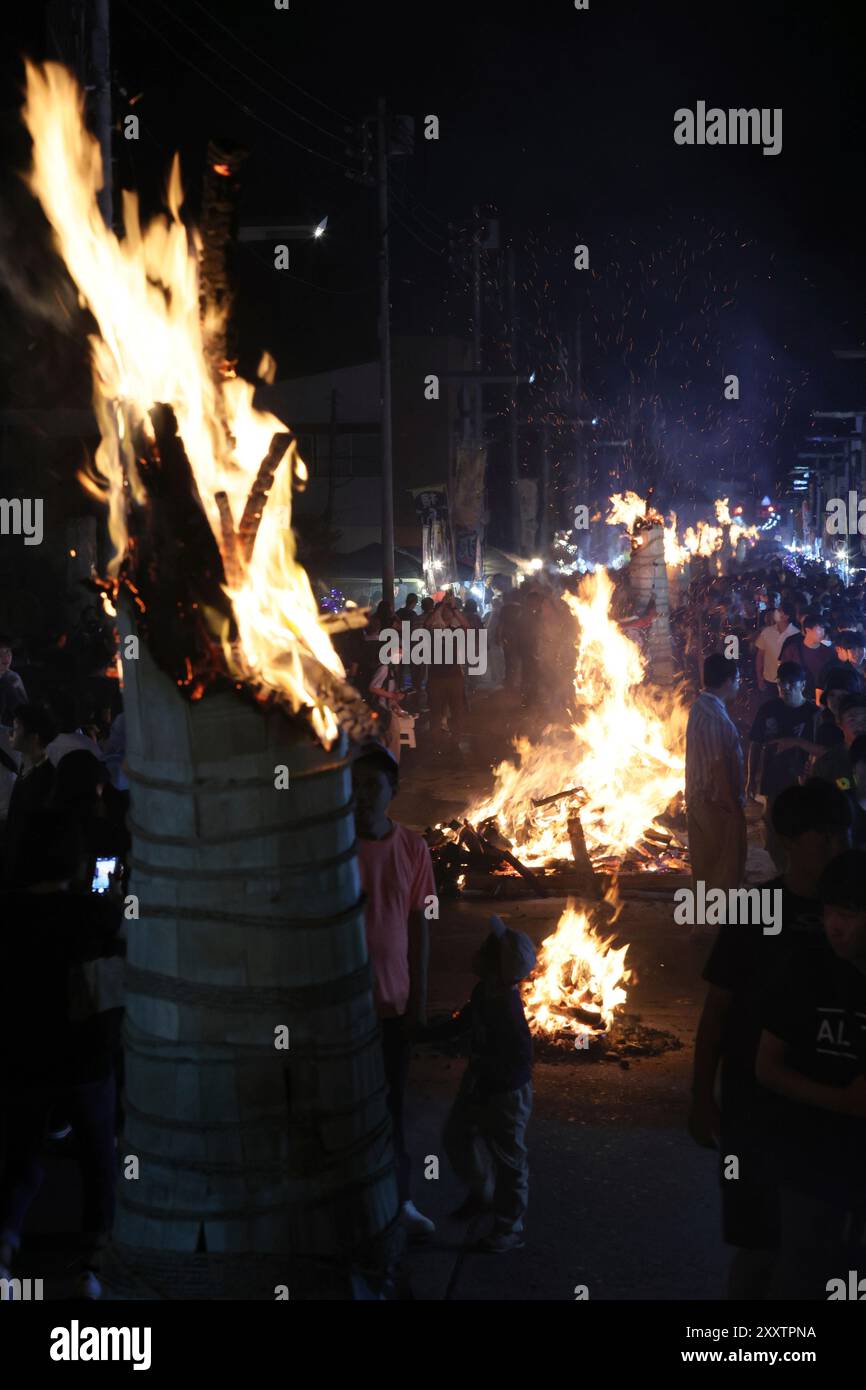 Giant torches, each standing about three meters tall and weighing 200 ...
