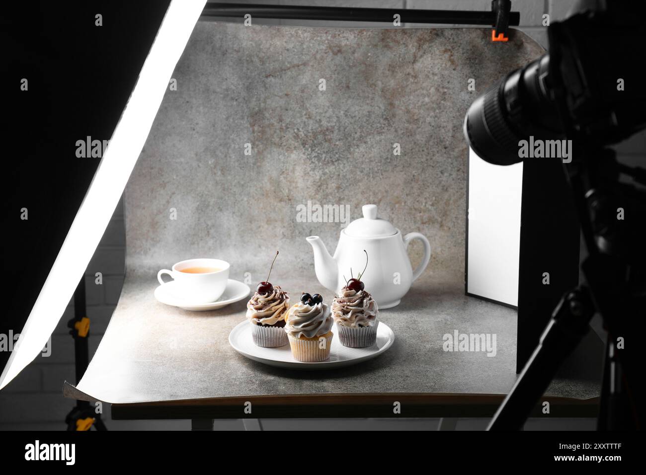 Shooting food in photo studio with professional lighting equipment ...