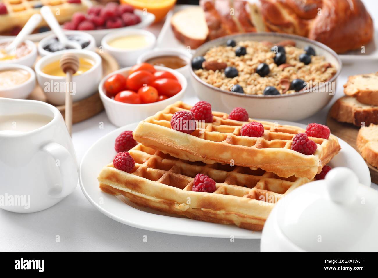Different meals served for breakfast on white table, closeup. Buffet ...
