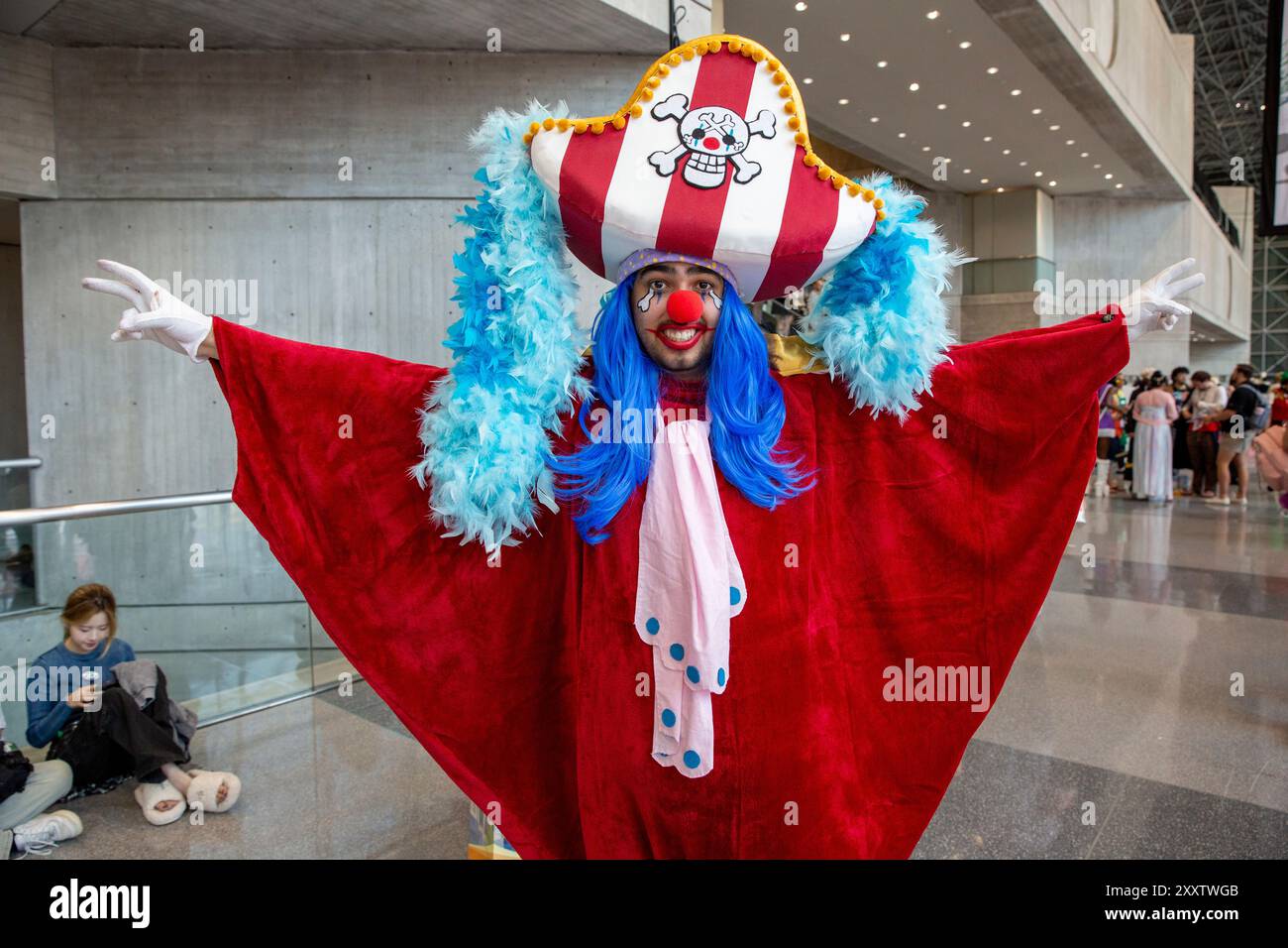 A cosplayer dressed as Buggy the Clown from the One Piece manga and ...