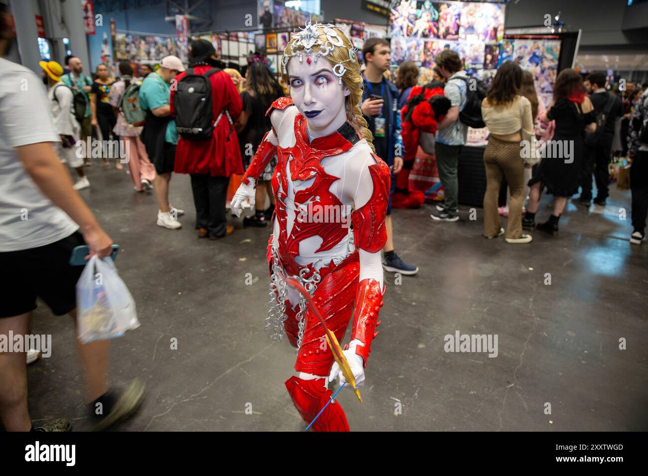 A cosplayer dressed as Orin the Red from the Baldur's Gate III video ...