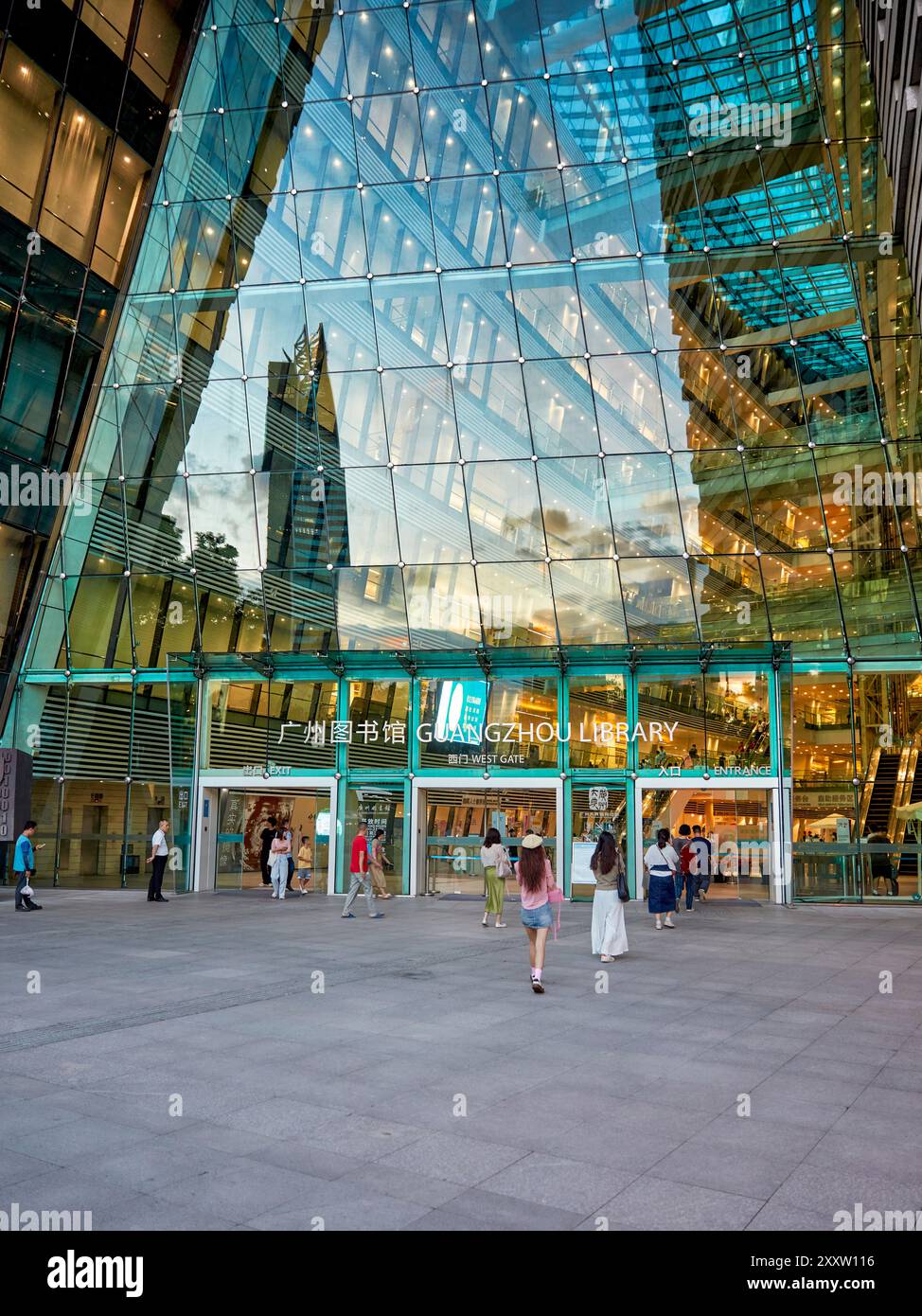 Glass facade and entrance gate of the Guangzhou Library building ...