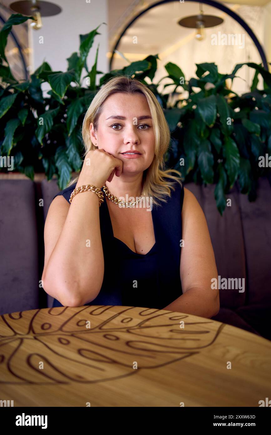 middle-aged plus size woman in old money style clothes in a fancy ...