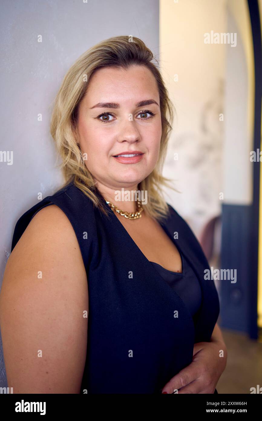 middle-aged plus size woman in old money style clothes in a fancy ...