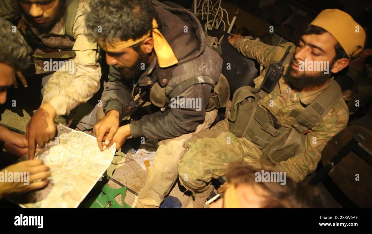 Members of the Jaish al-Fatah coalition by the west side of the gate of ...