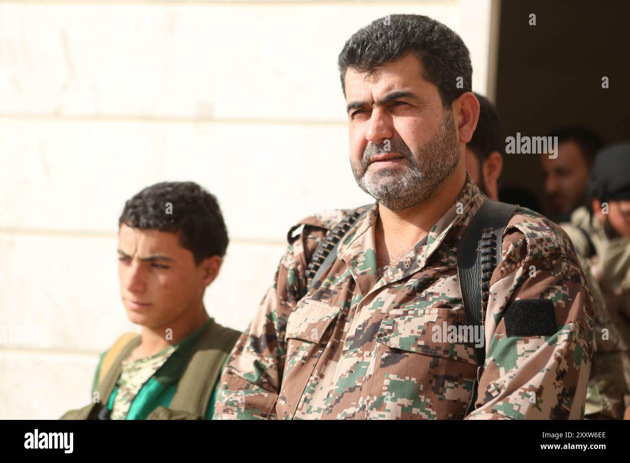 Abu Baker, the leader of Jaish al-Mujahideen, leads the battle to break ...
