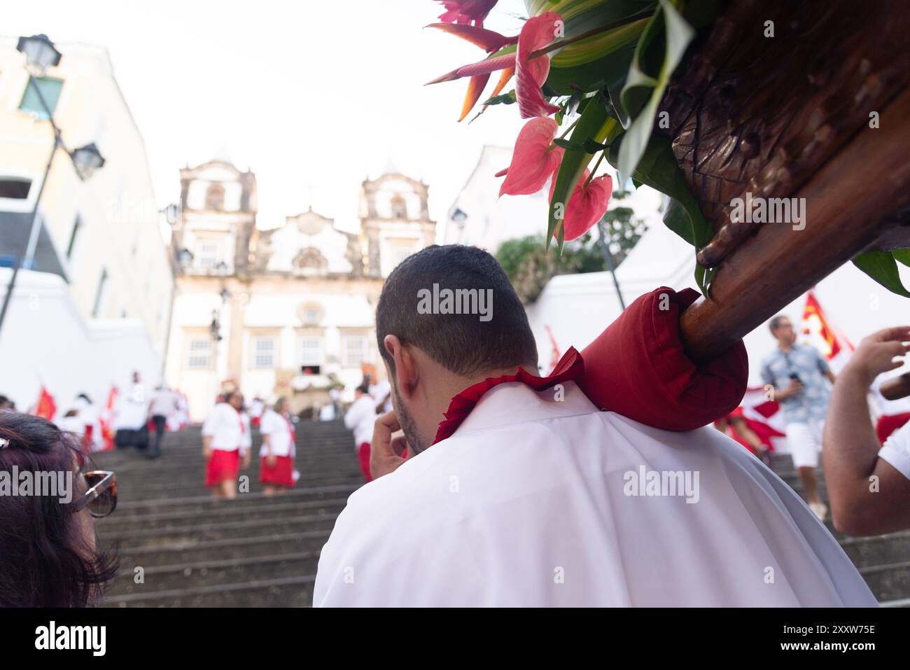 Catholic faithful are seen carrying a float and an image of Jesus ...