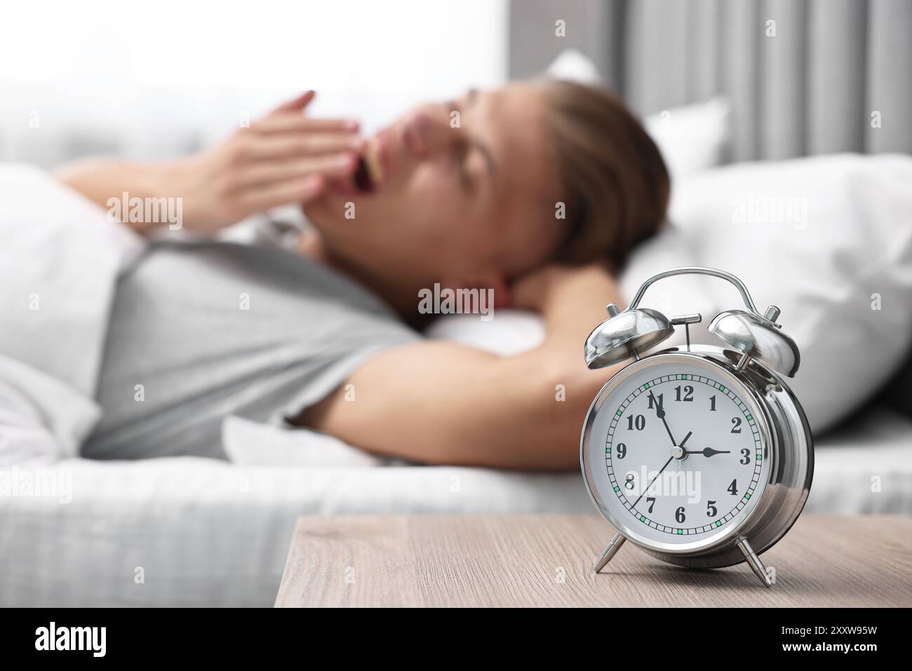 Man waking up in bedroom hi-res stock photography and images - Alamy