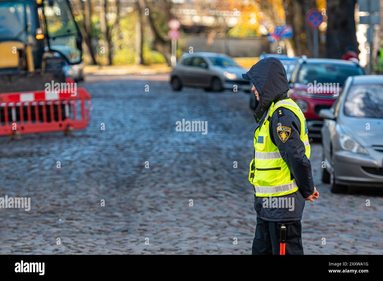 Worker directing pedestrians vehicles hi-res stock photography and ...
