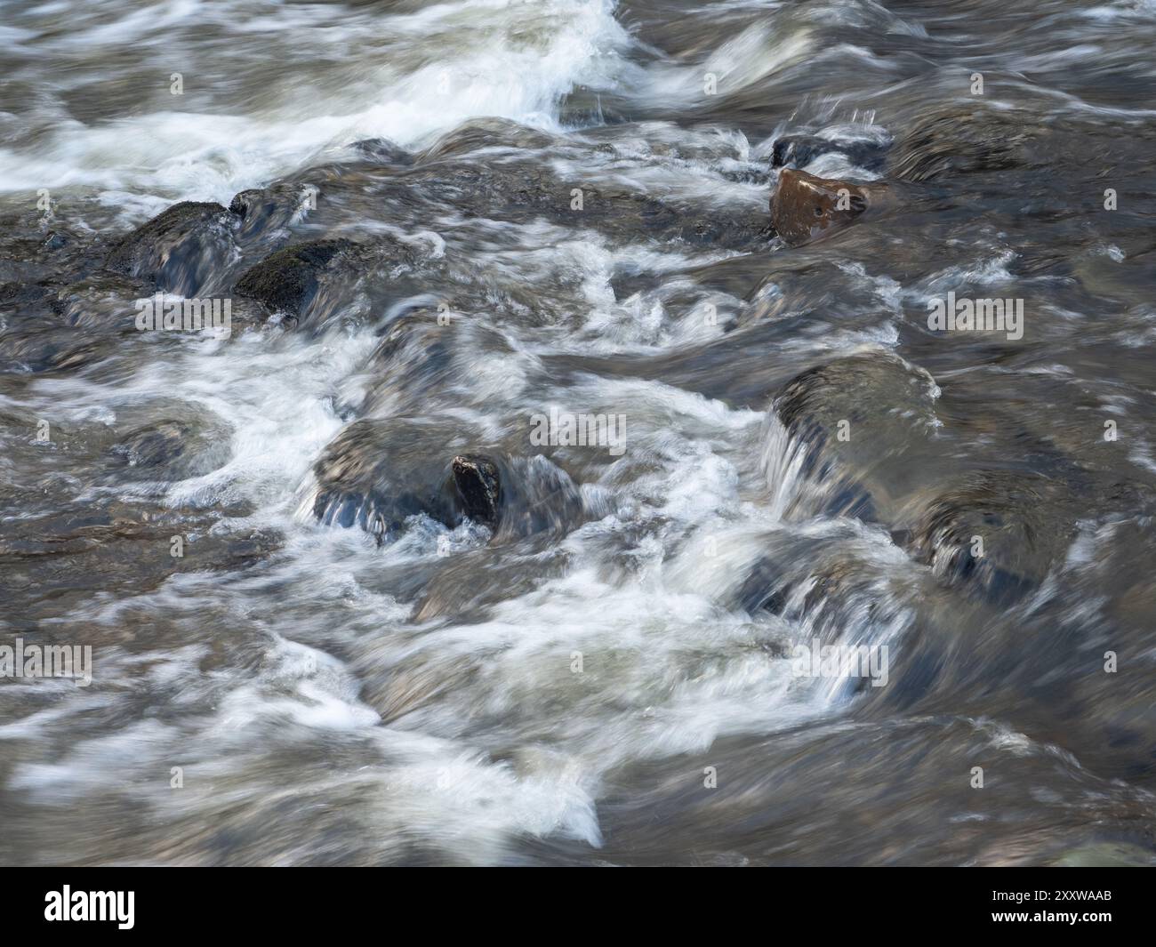 Swirling river water Stock Photo - Alamy