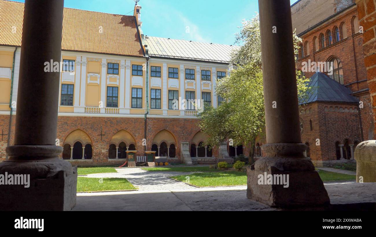 The historic courtyard of Riga Cathedral reveals a beautifully ...