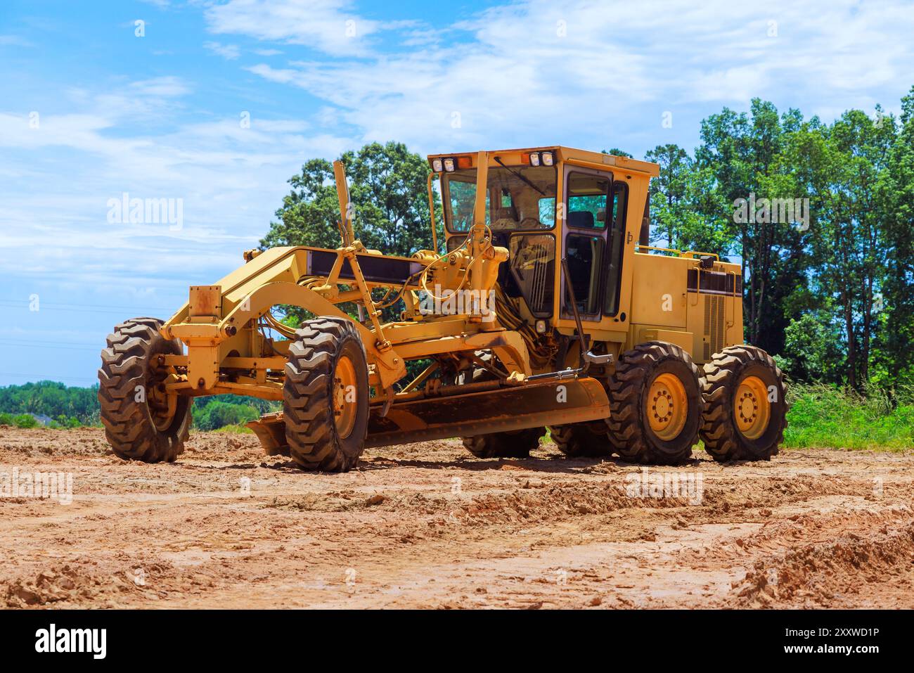 Having to work at construction site with heavy earthmoving construction ...