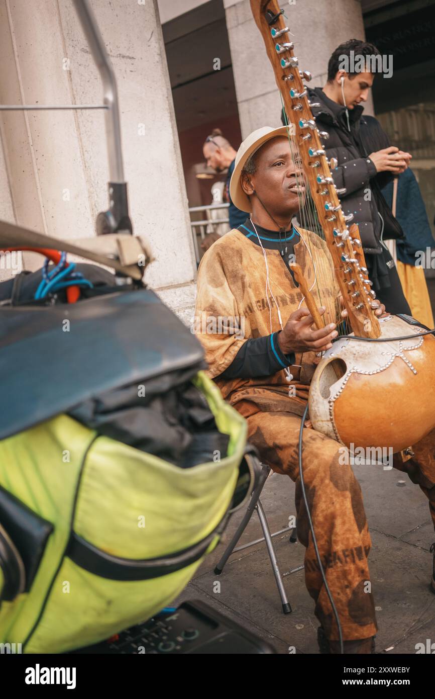 Euro Finals - London - UK - 2024.07.14: A street musician performs at ...
