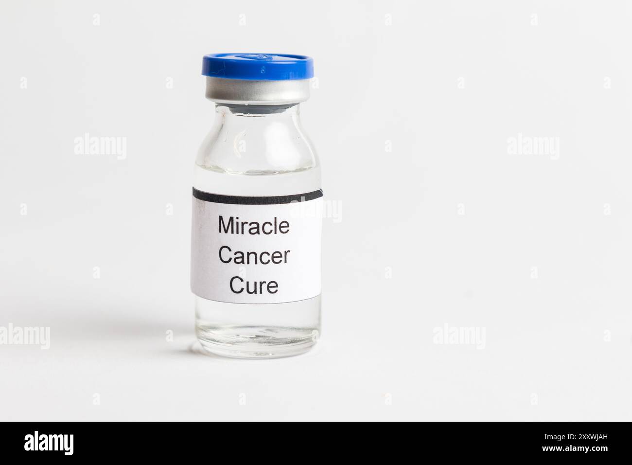 A Medical Vial with a label reading Miracle Cancer Cure Stock Photo - Alamy