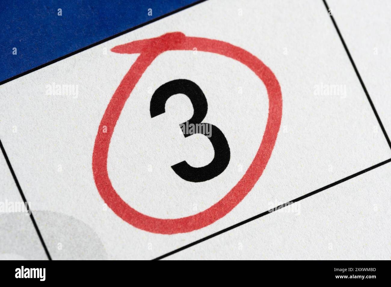 Third number, in calendar is circled with red marker Stock Photo - Alamy