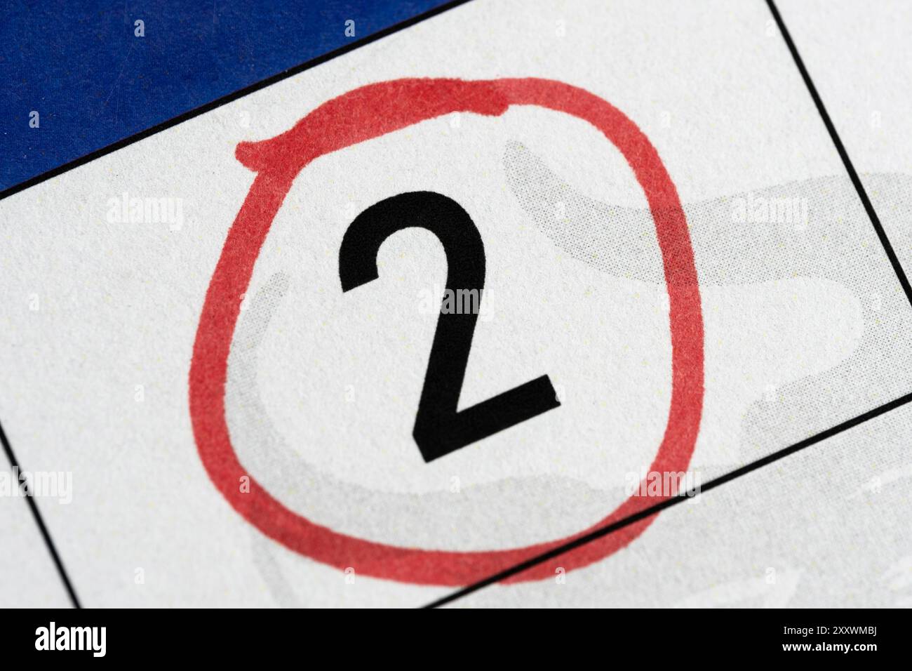 Second number in calendar is circled with red marker Stock Photo - Alamy