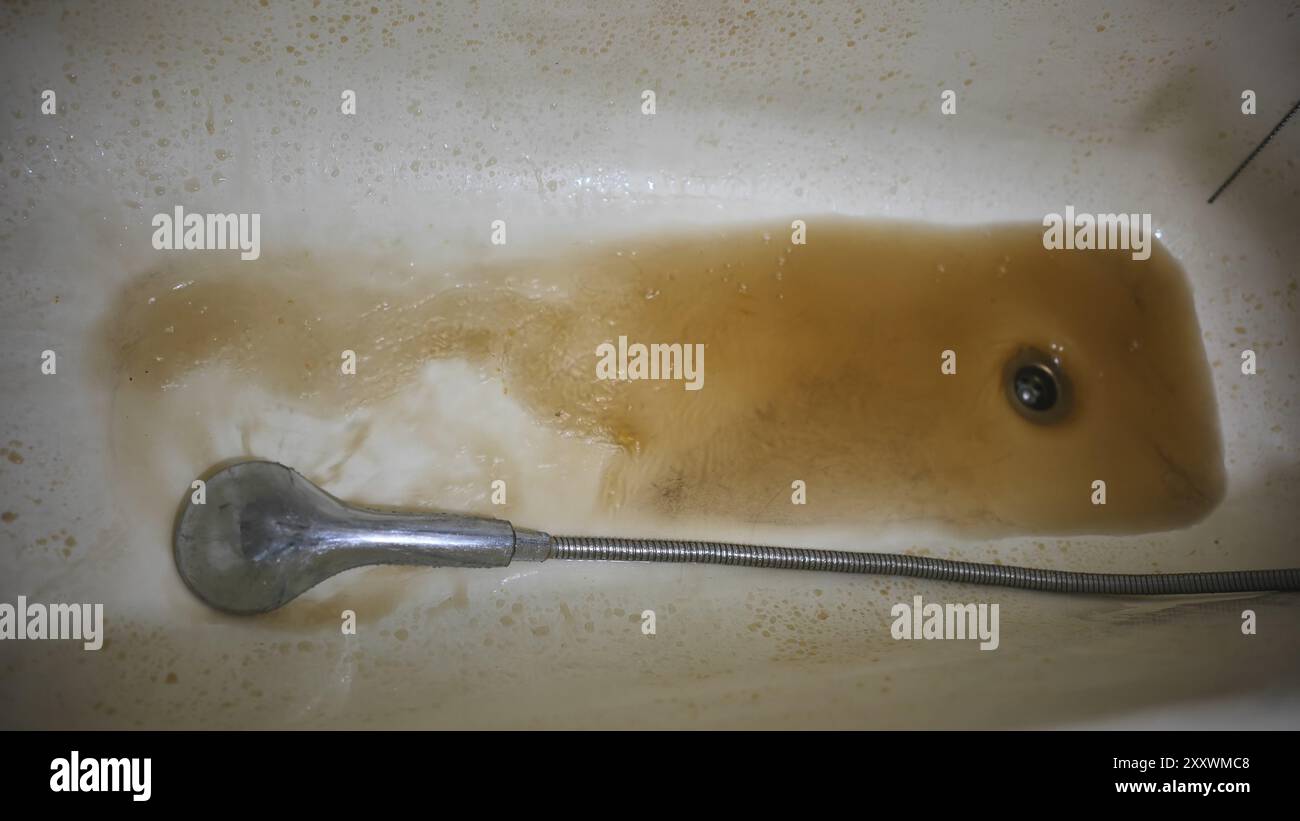 Rusty water pours from tap hi-res stock photography and images - Alamy