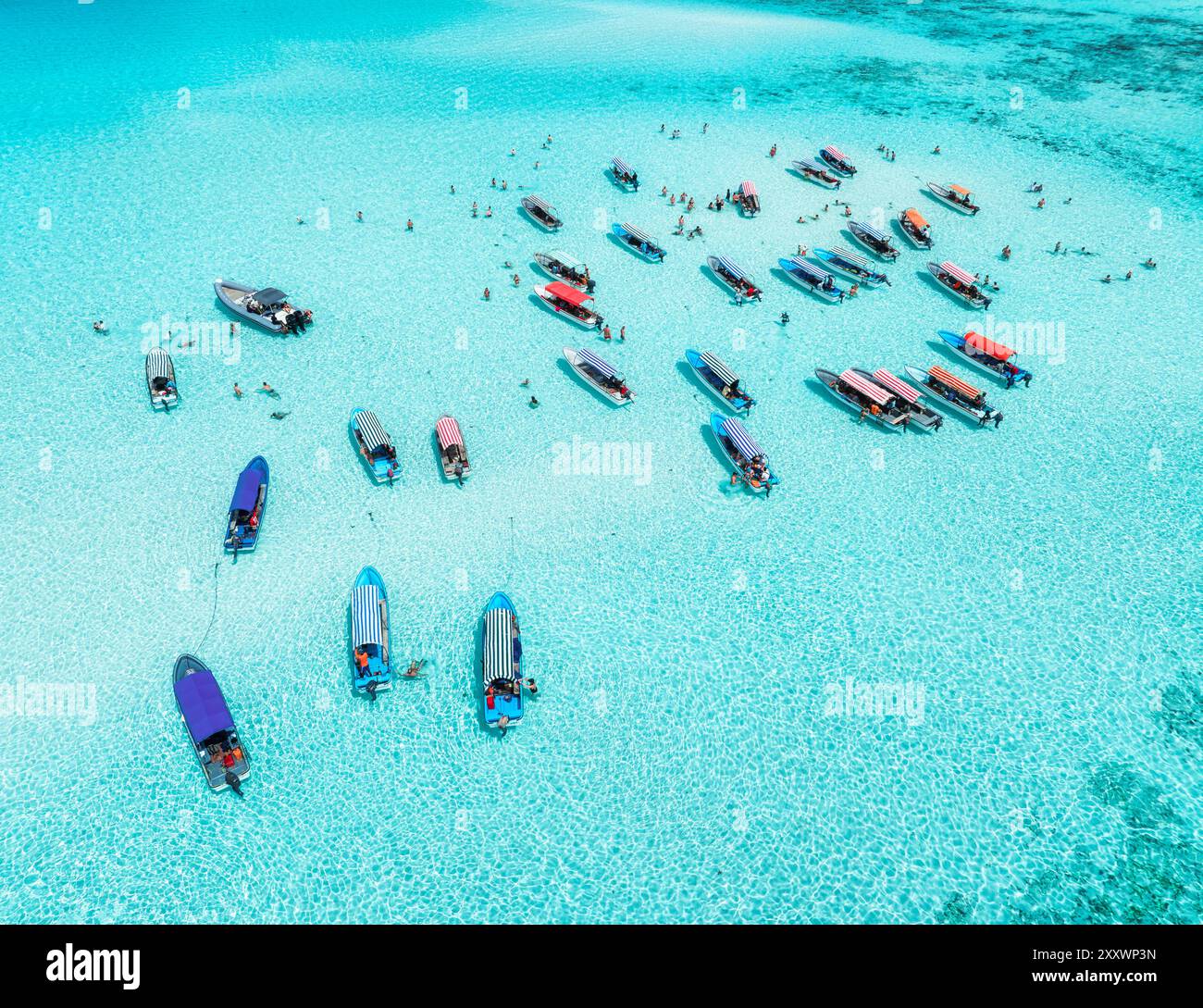 Aerial view of colorful boats, sea bay with azure water in summer Stock ...