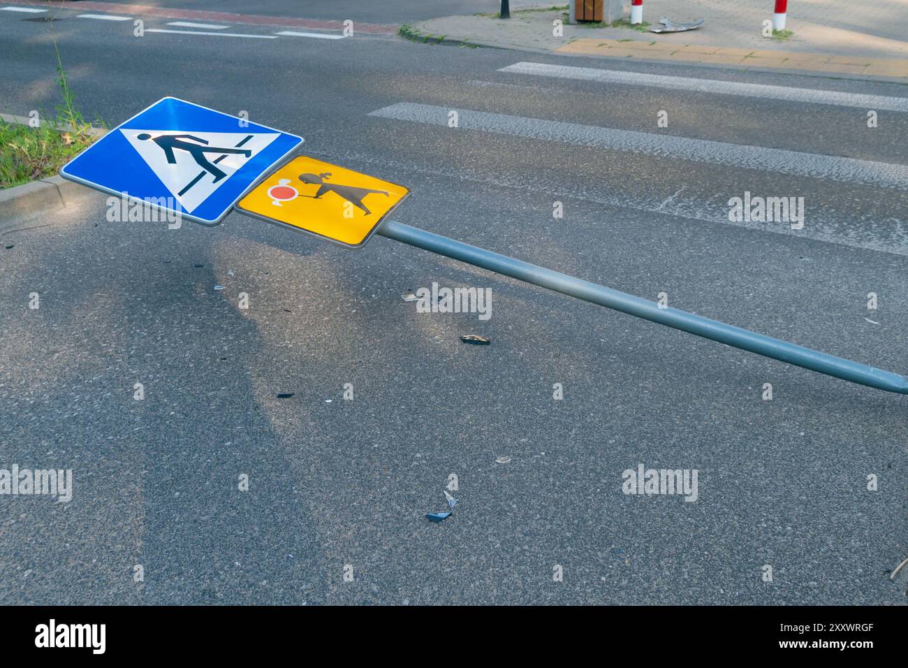 A fallen pedestrian and children's crossing sign. Accident. Traffic ...
