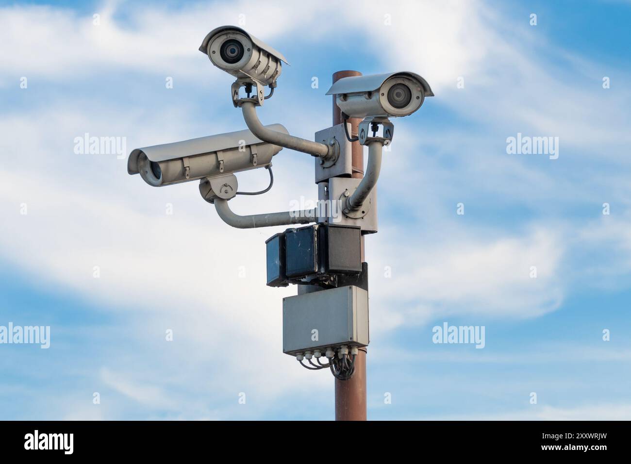 City surveillance cameras. Three cameras looking in different ...