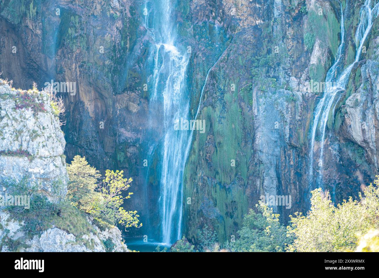 Waterfalls in the forest flowing into lakes. Tourists visit famous ...