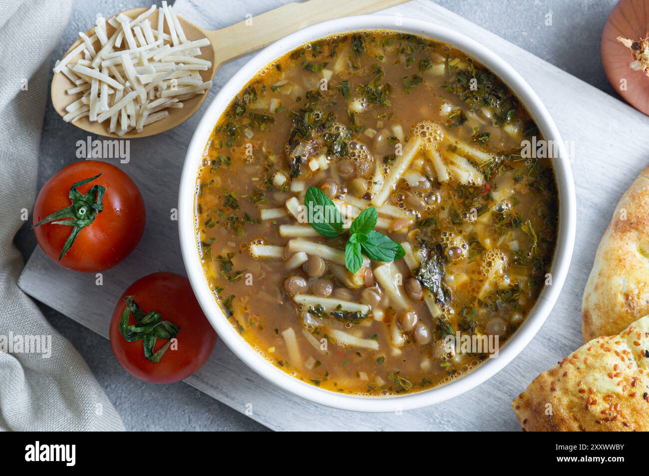 Traditional Turkish thin bar shaped dough soup, homemade noodle soup ...