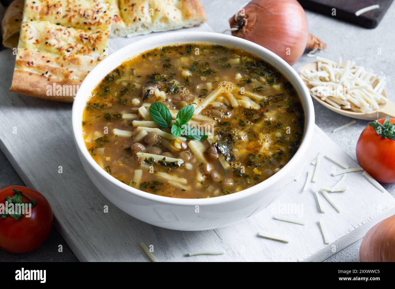 Traditional Turkish thin bar shaped dough soup, homemade noodle soup ...