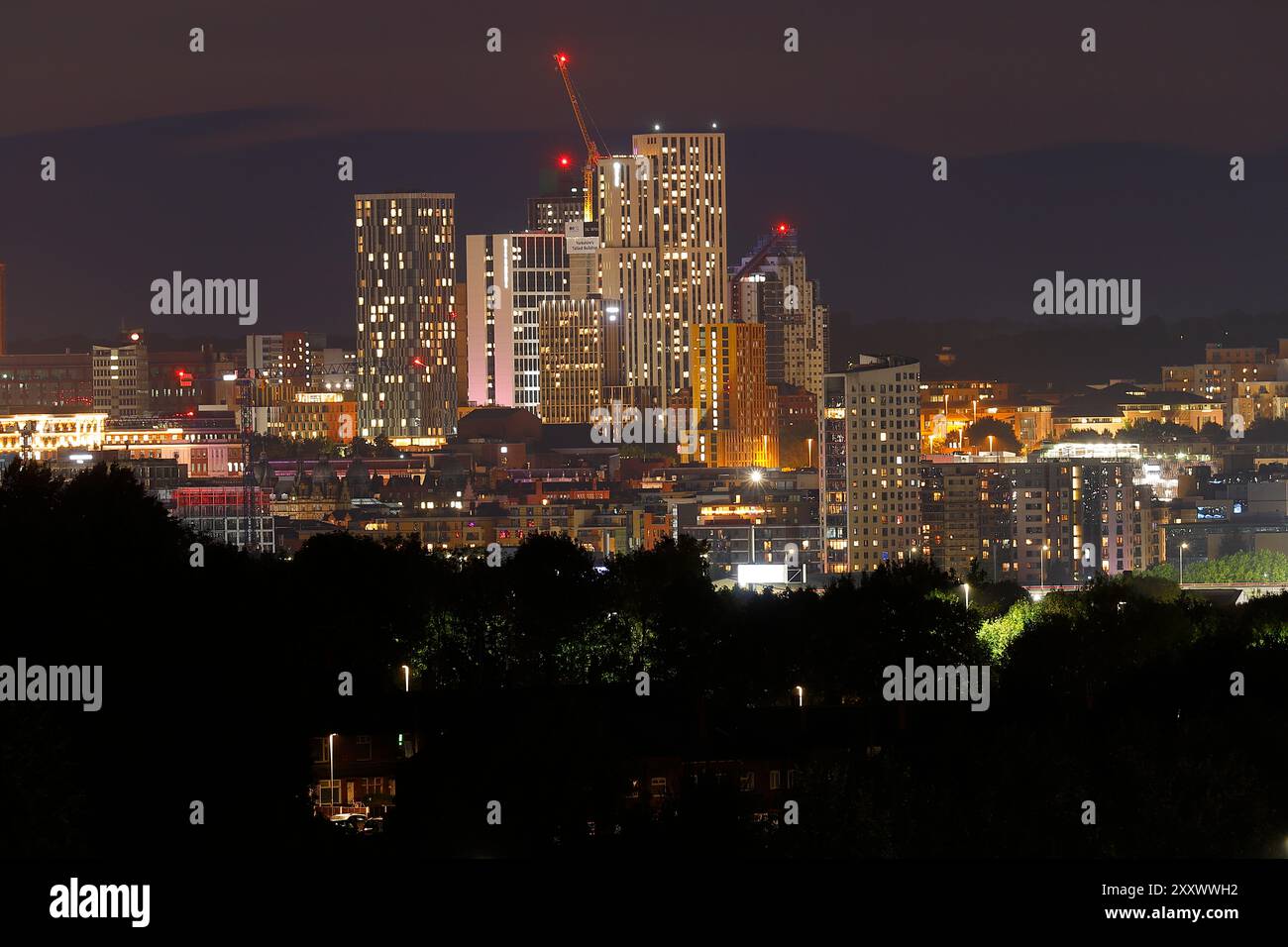 A distant view of Leeds City Centre at night Stock Photo - Alamy