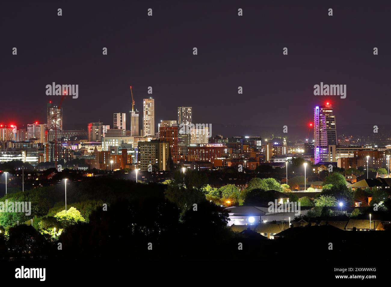 A distant view of Leeds City Centre at night Stock Photo - Alamy