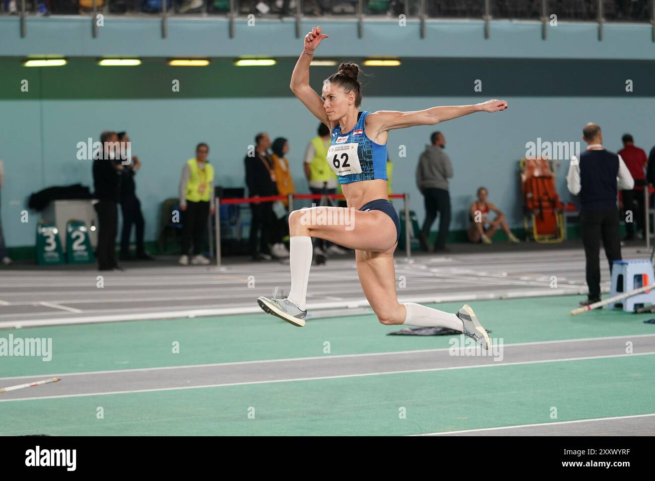 ISTANBUL, TURKIYE - FEBRUARY 10, 2024: Undefined athlete triple jumping ...
