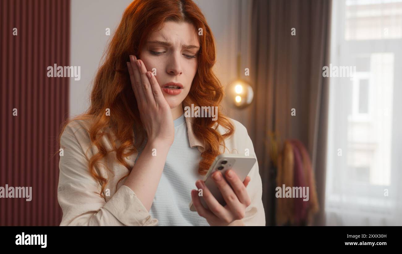 Shocked upset Caucasian woman girl lady scrolling screen sad female ...