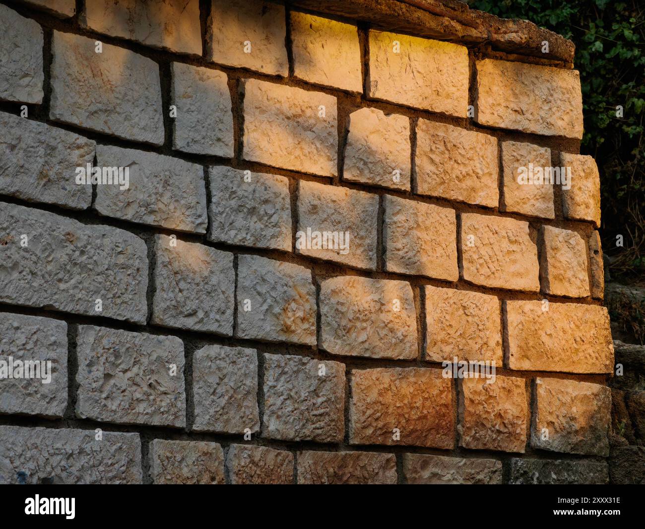 Sunlit Stone Wall: A Study of Pattern and Texture. Close up Stock Photo ...