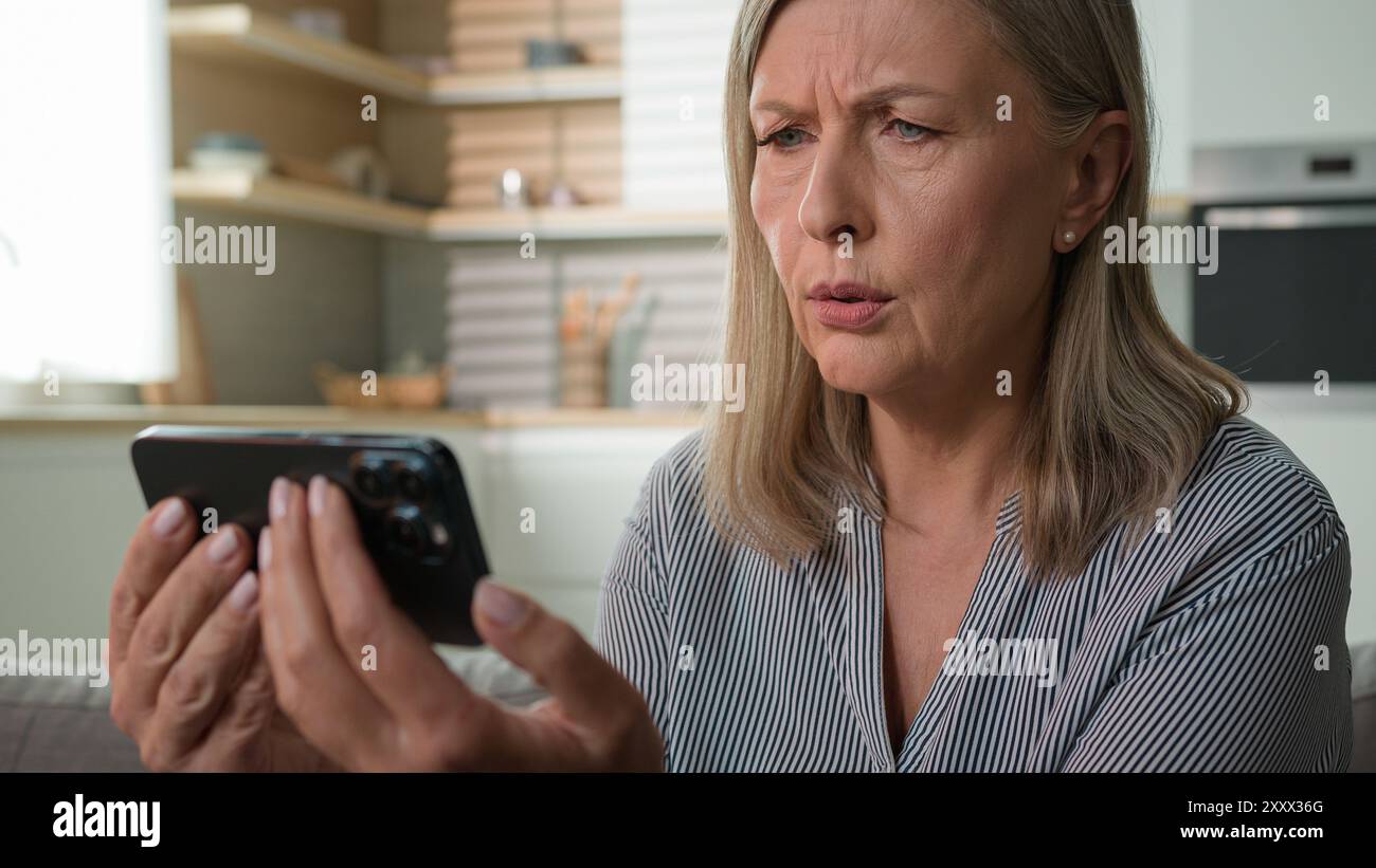 Shocked anxious 70s retired senior Caucasian woman elderly female ...