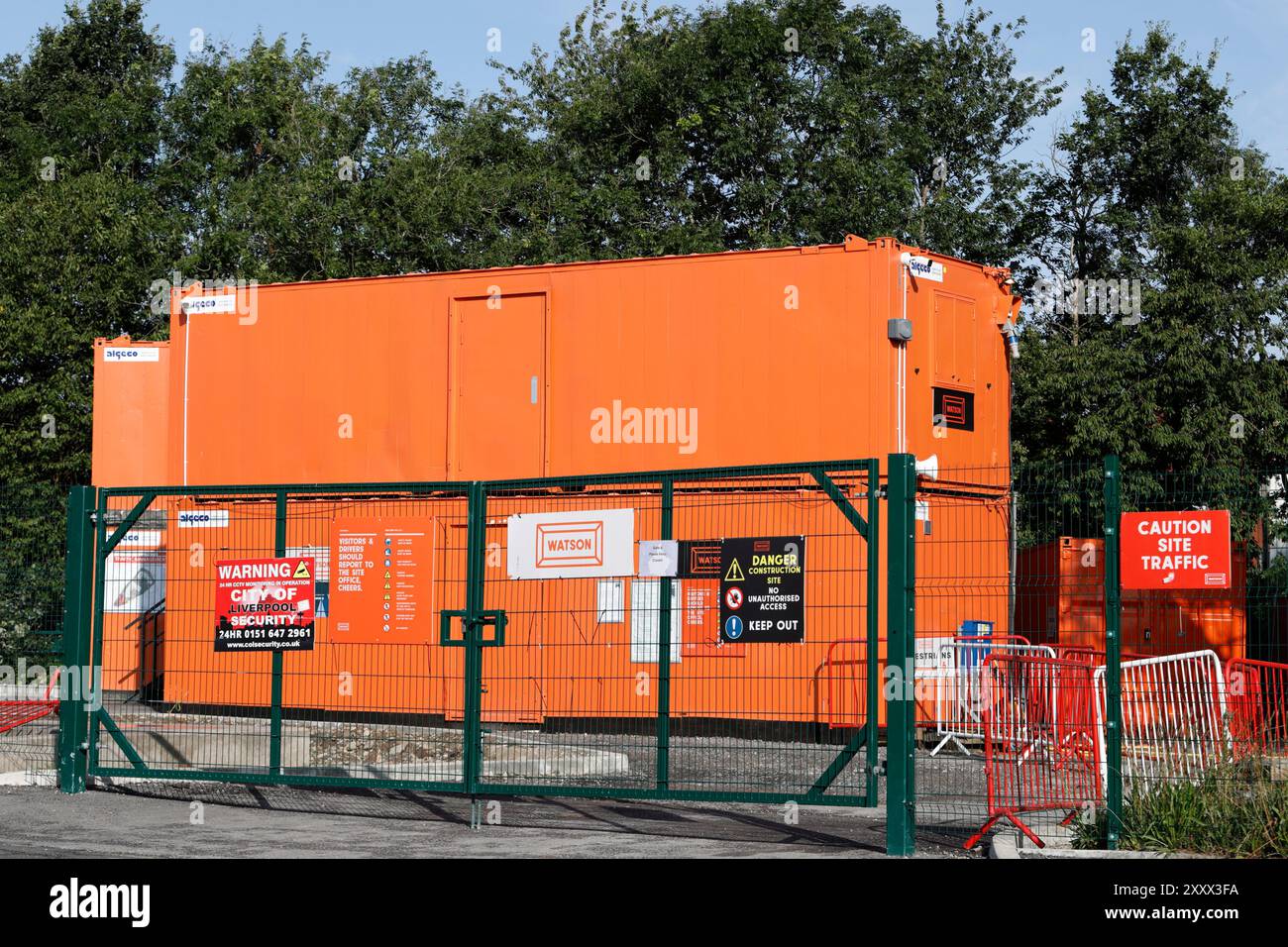 Two orange containers used as offices on construction site in radcliffe ...