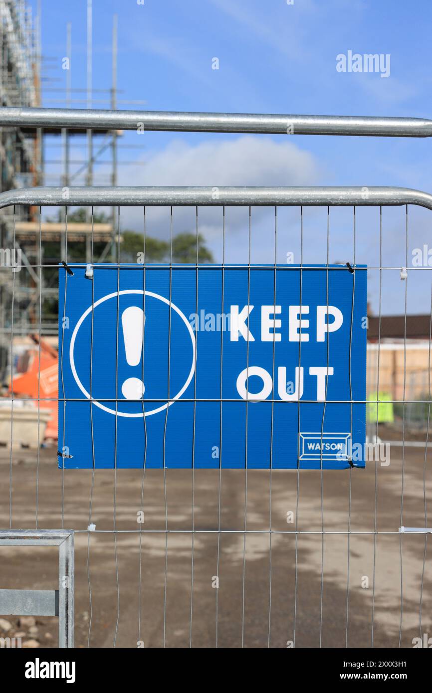 Keep out sign, blue sign with white lettering mounted on steel security ...