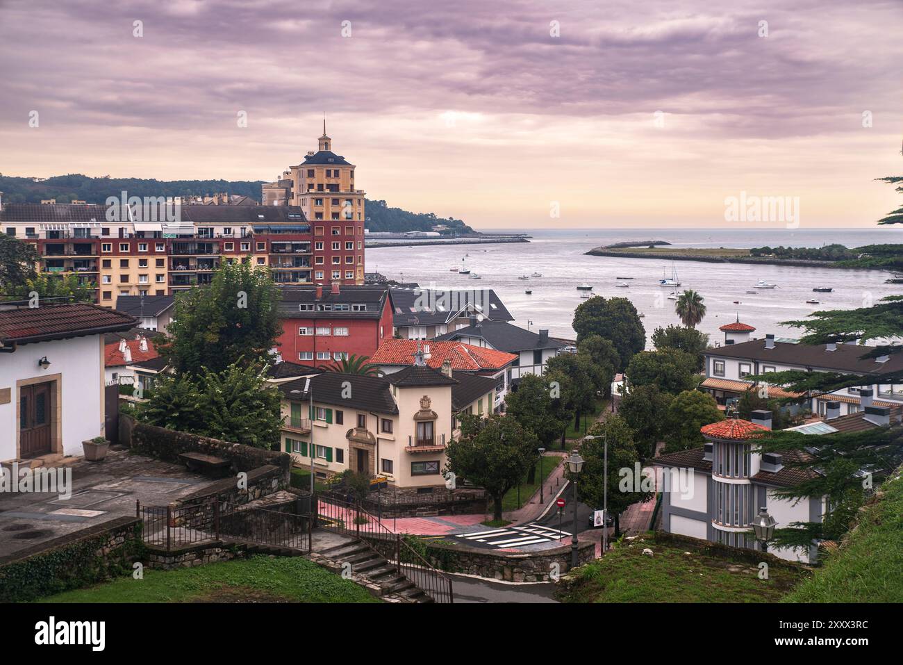 Panorama of the city of Irun in Spain with the sea, trees and typical ...