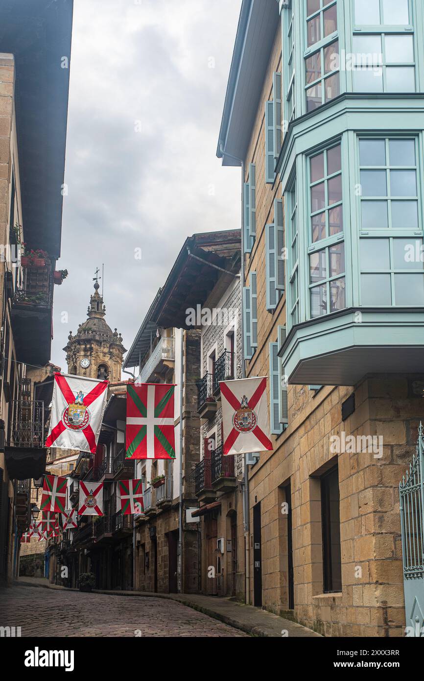 Street of the city of Irun in Spain with the cathedral and typical ...