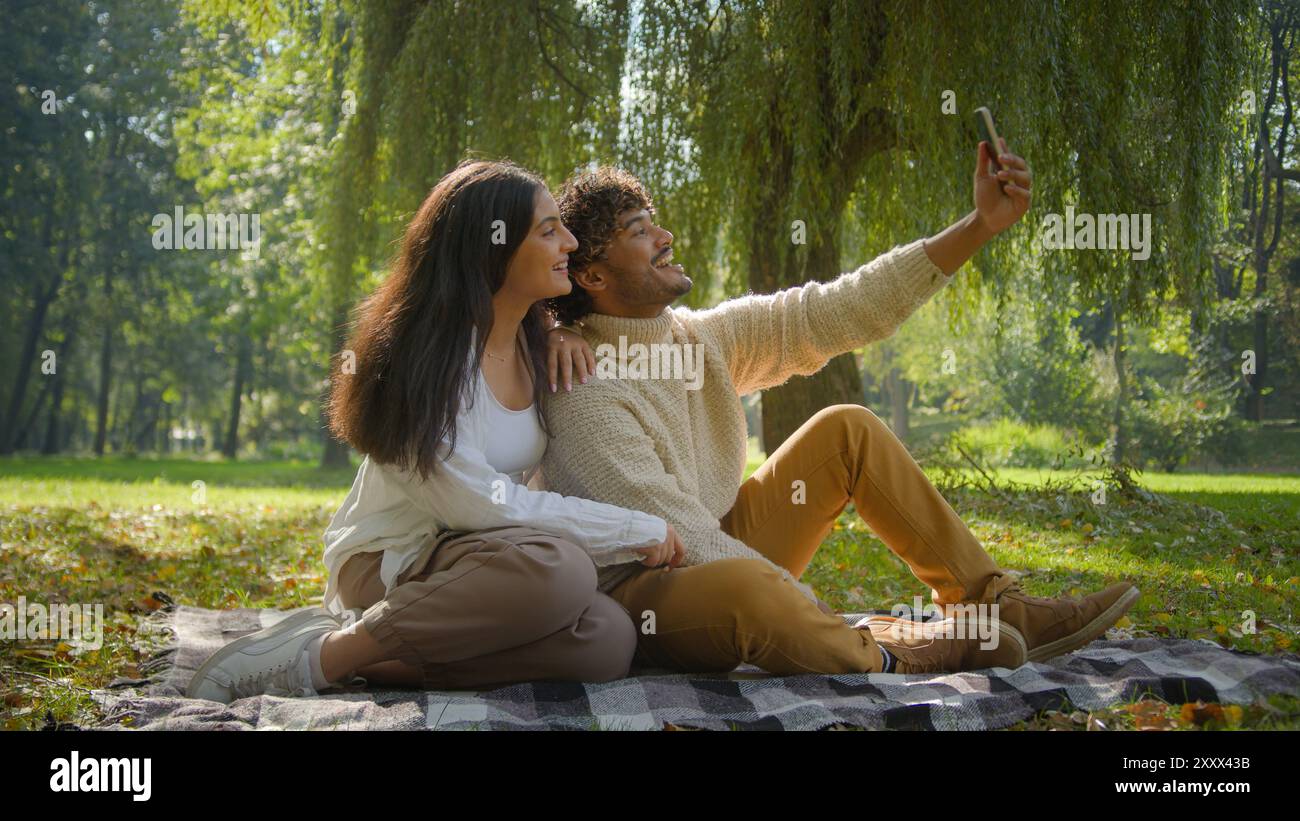 Happy multiracial couple Hispanic girlfriend woman Indian man boyfriend ...