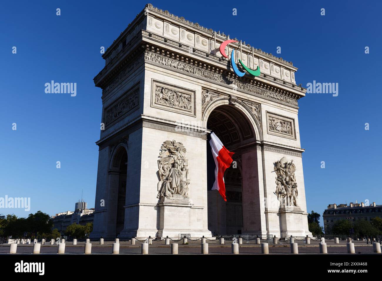 The Triumphal Arch decorated with French flag and agitos - the symbol ...