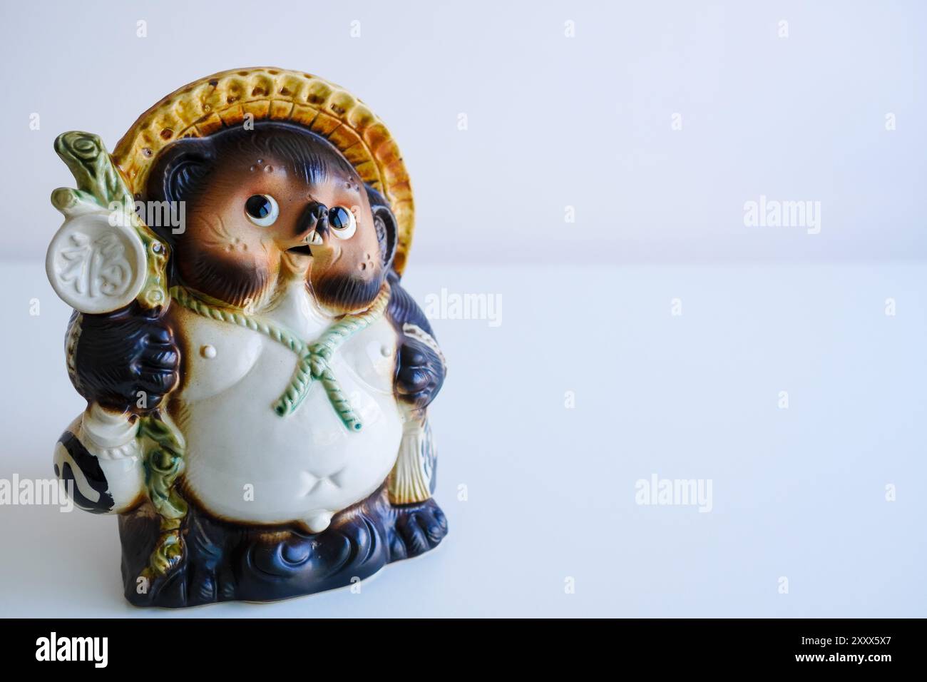 Shigaraki pottery Japanese Tanuki Cute Raccoon Dog on white background ...