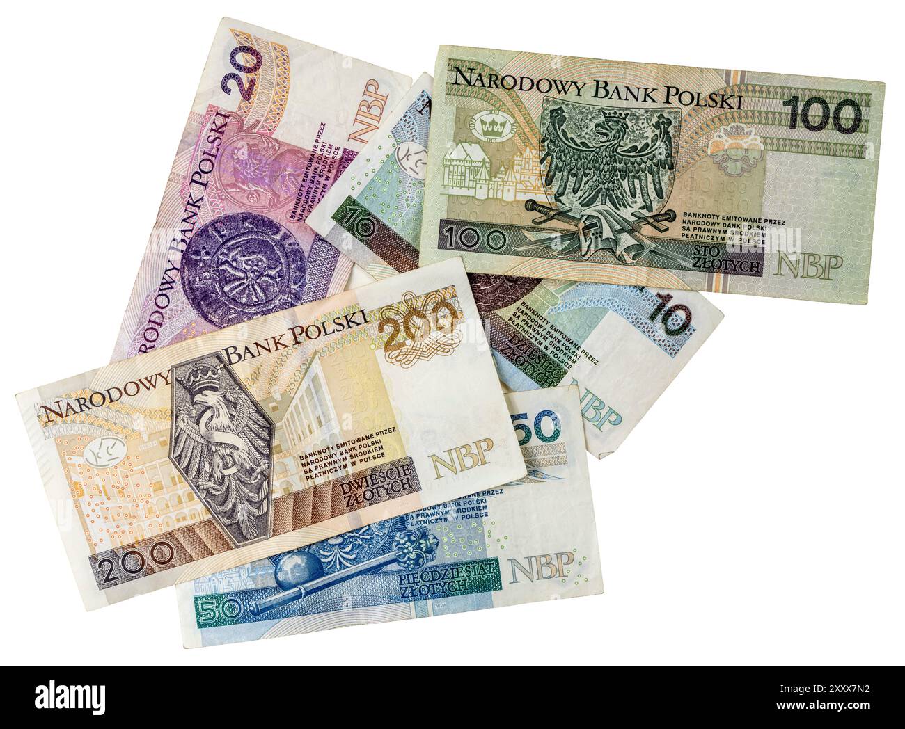Polish banknotes scattered on white background. 10, 20, 50, 100 and 200 ...