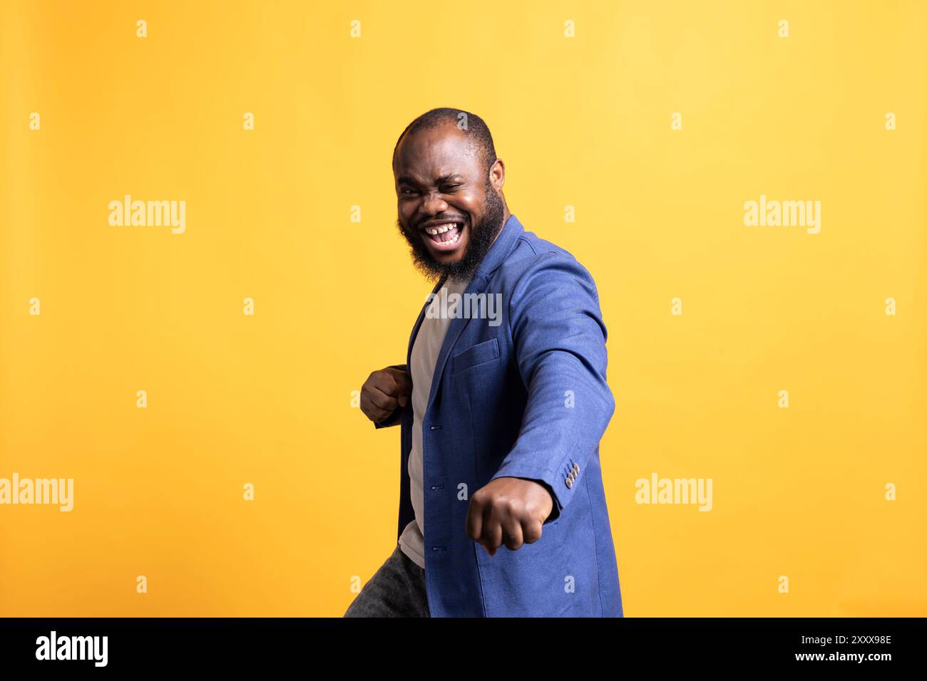 Portrait of showy african american motivational speaker gesturing with ...