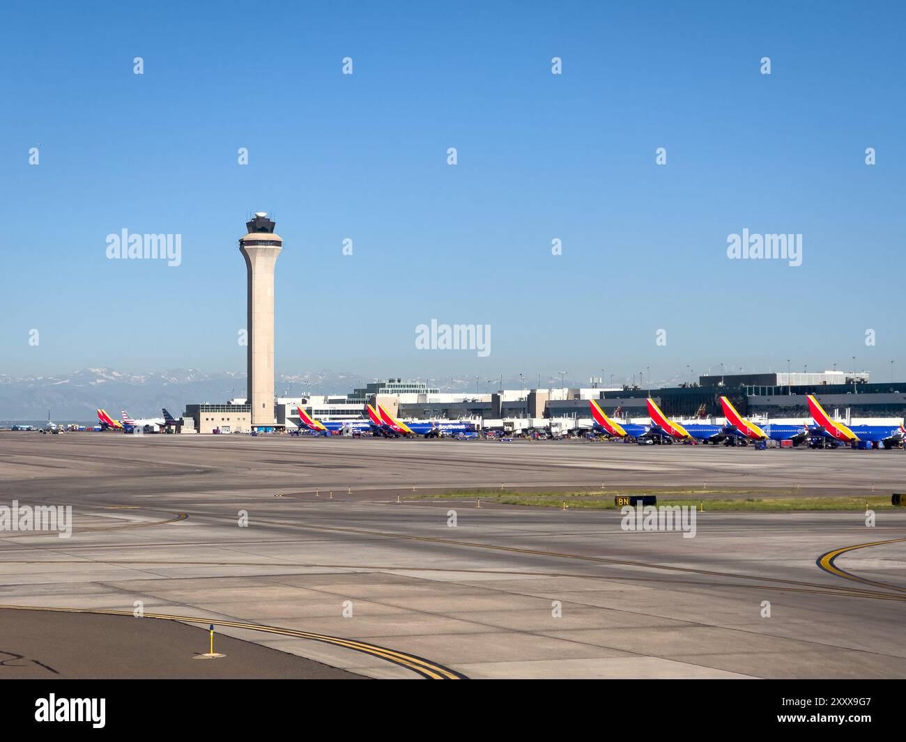 Denver International Airport view of control tower and airplanes on ...