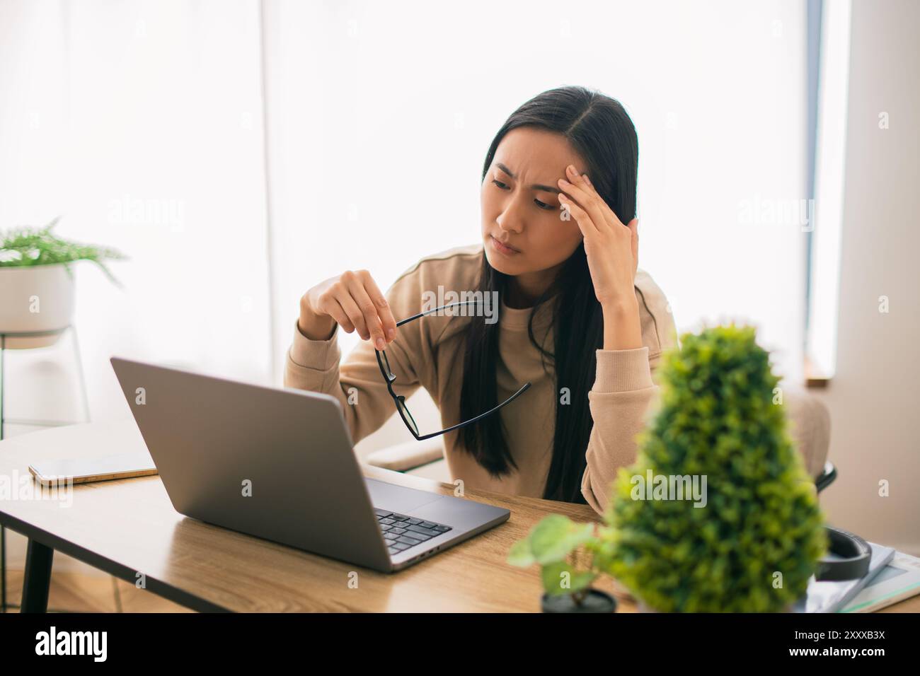 Tired Young Asian Korean woman worker student take short pause in ...